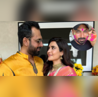 Karishma Tanna gives a kiss of love to hubby Varun Bangera as they ...