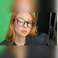 Ginger-haired Jennie turns into a spectacled beauty for new photos ...