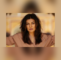 Sushmita Sen greets fans in an open car as she attends Sangai festival ...