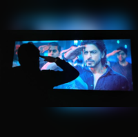Photo of Shah Rukh Khan fan saluting Pathaan in theatre goes viral ...