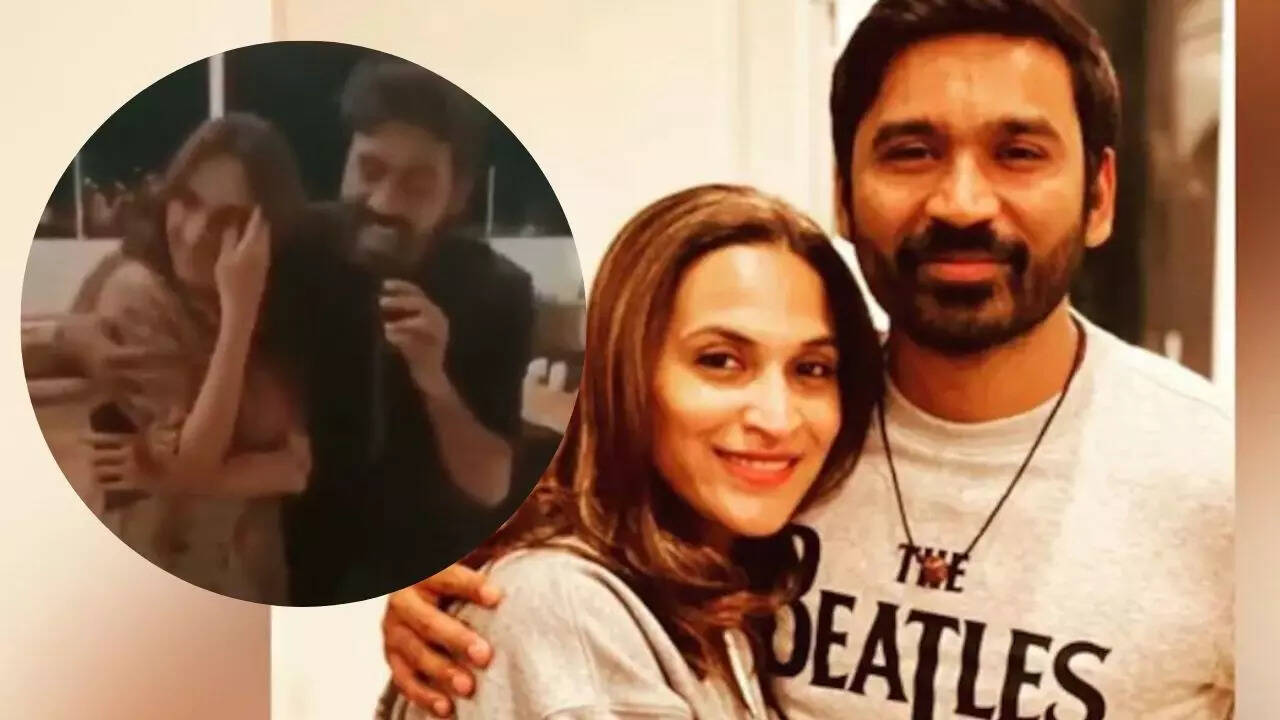 Video of Dhanush romantically singing and hugging Rajinikanth's ...