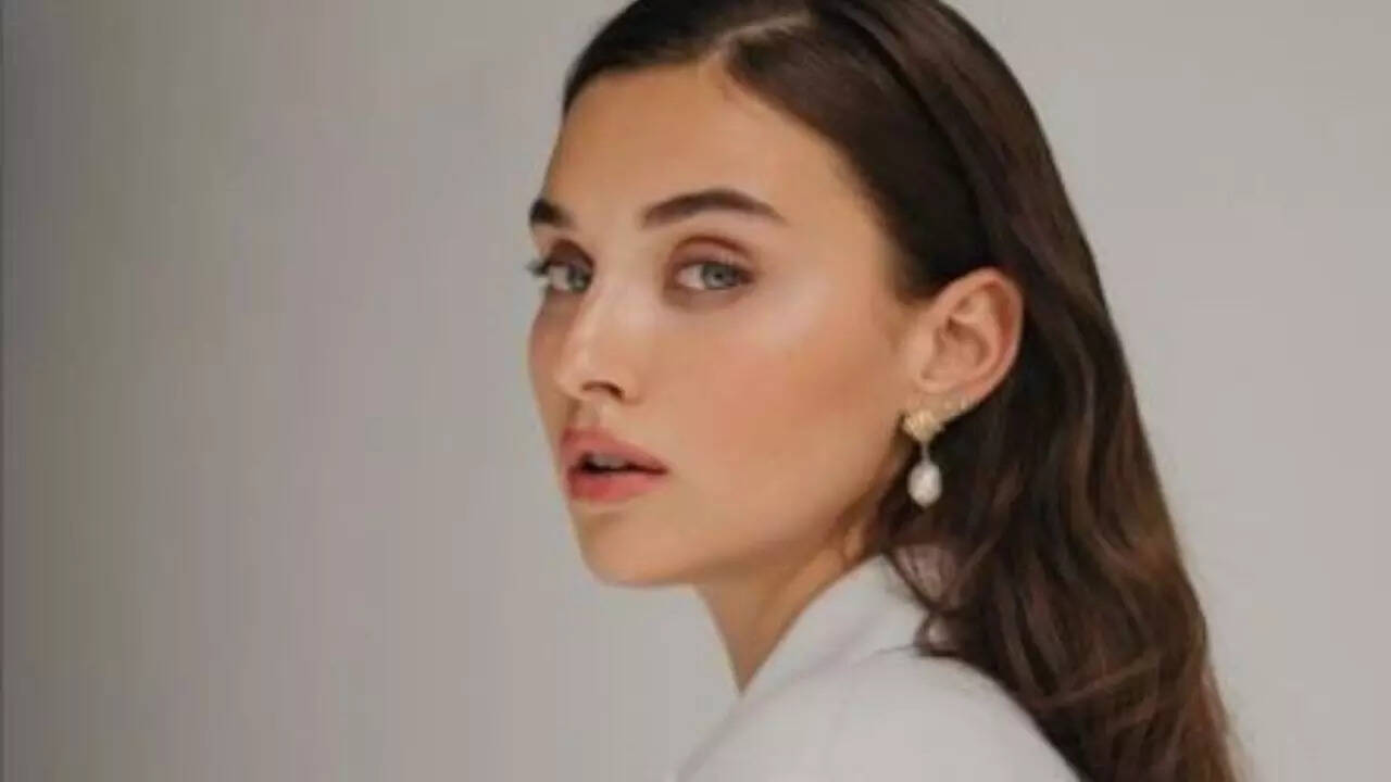 Former Miss Ukraine recalls harrowing escape: Above my head, dozens of ...