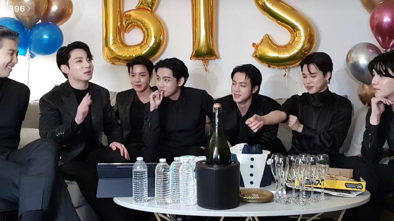 Jin accidentally hurts injured hand during group's LIVE; other BTS boys ...