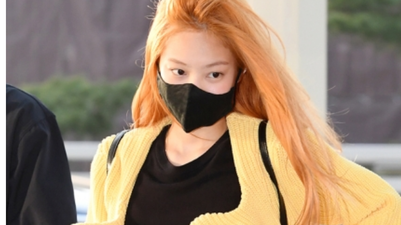 Blackpink's Jennie flexes new orange hair with a flip; struts through ...