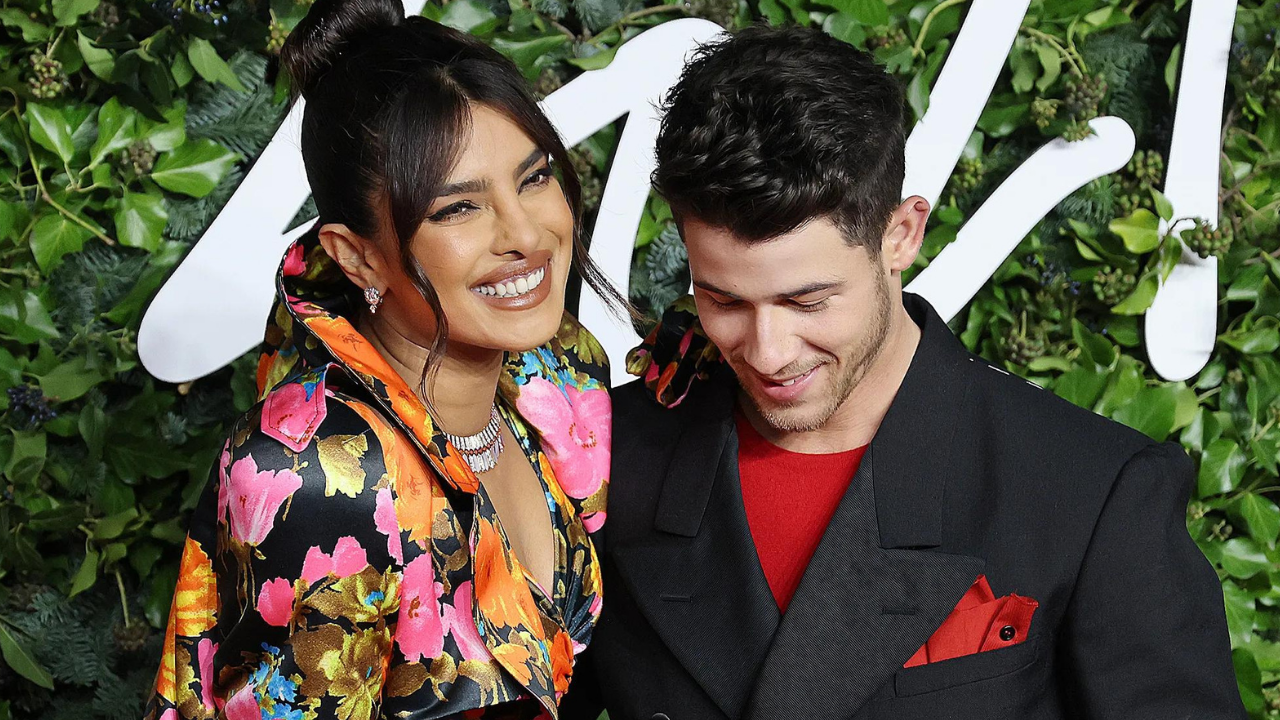 Wifey Priyanka Chopra plants a good luck kiss on Nick Jonas' lips before singer's match; see ...