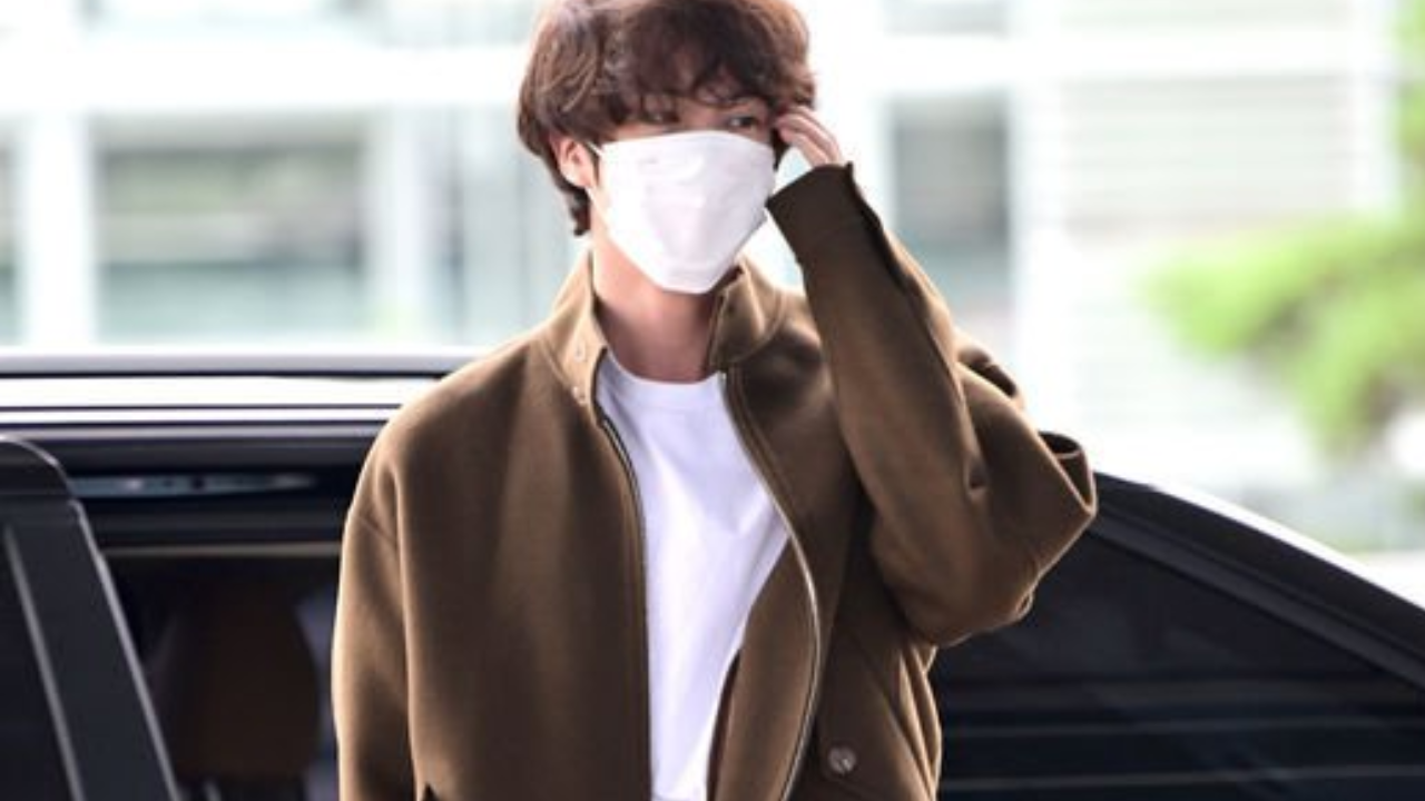 BTS' Jin completes his casual airport look with black leather bag worth ...