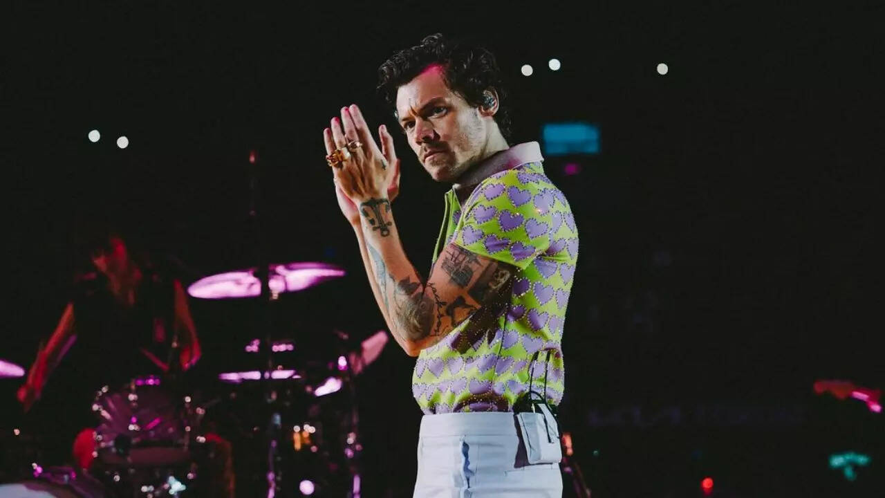 Styles: Singer Harry Styles gets hit in the eye with a candy during his ...